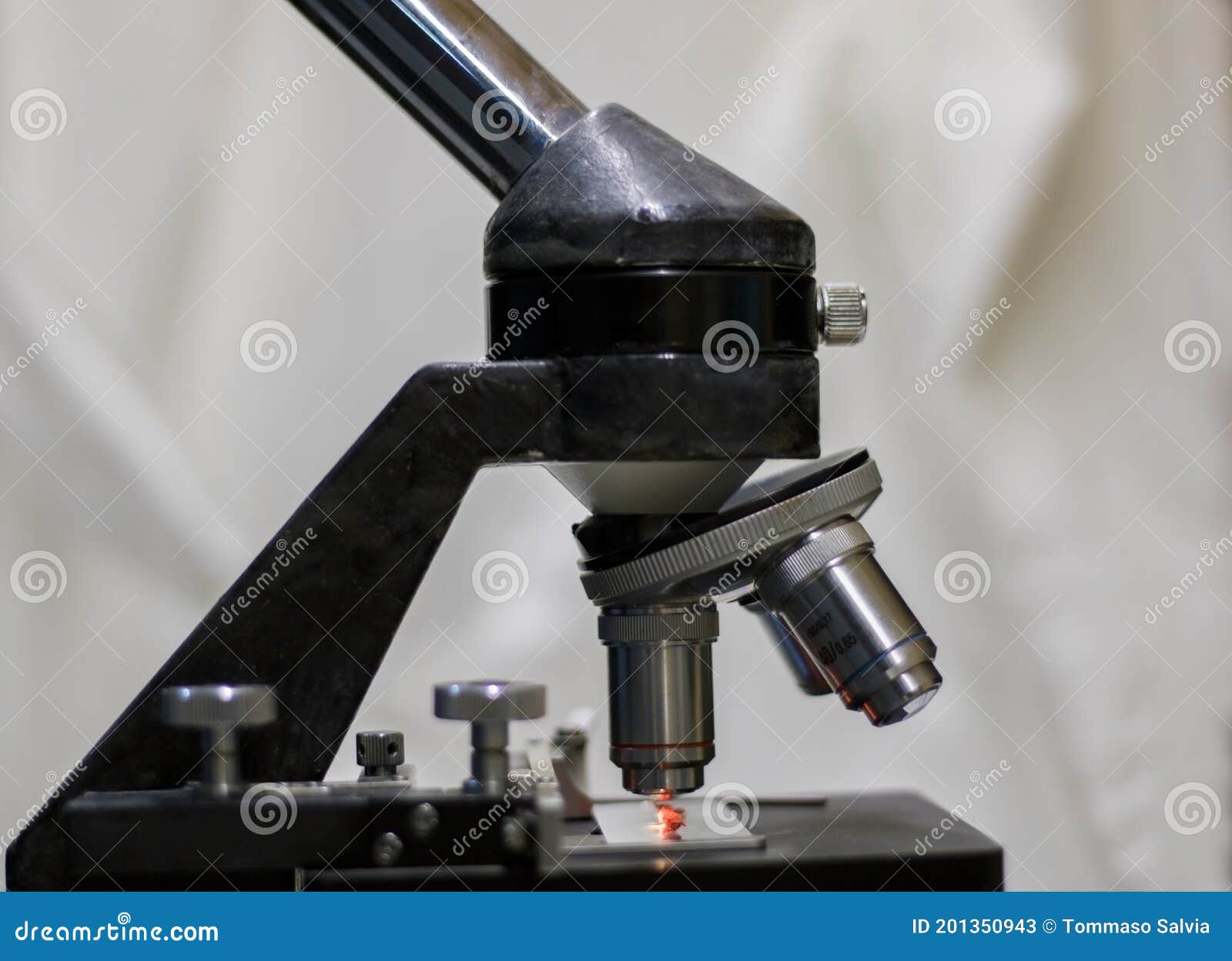 Side View of a Microscope while Analyzing a Red Thread. Stock Image ...
