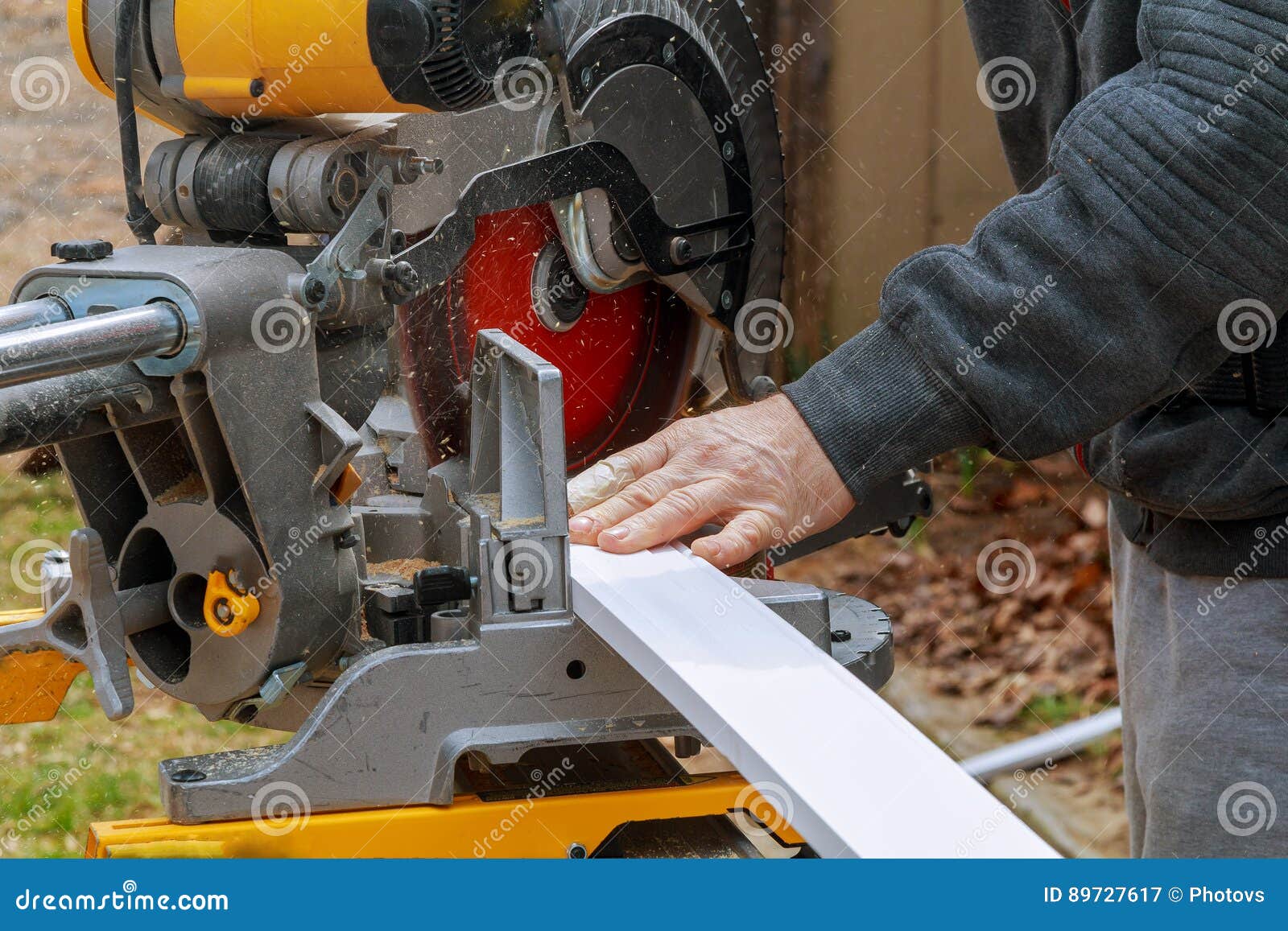 Side View of Mid Adult Manual Worker Cutting Wood Stock Image - Image ...