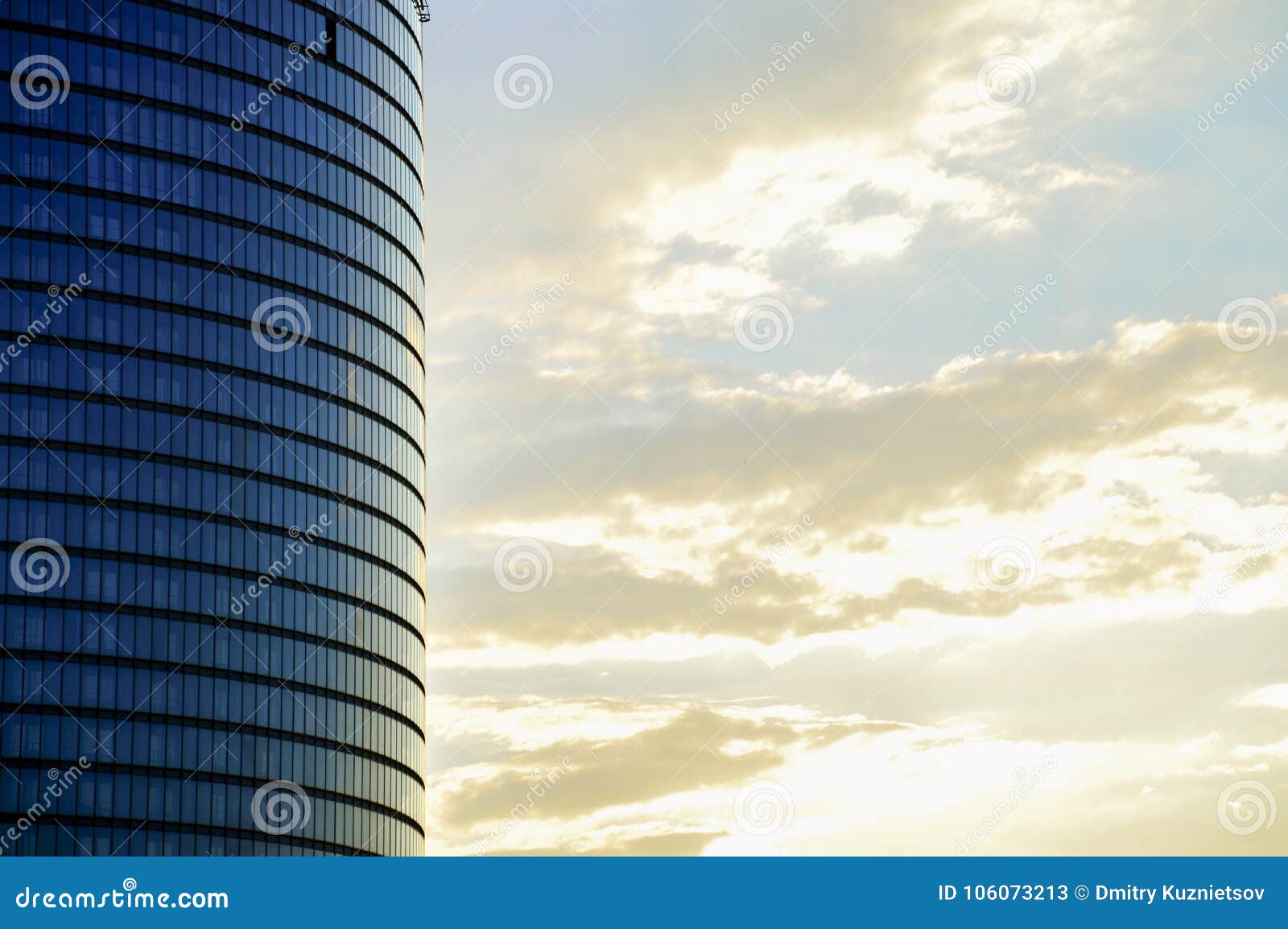 Side View of the Modern Glass Skyscraper Facade on the Late Sunrise Sky ...