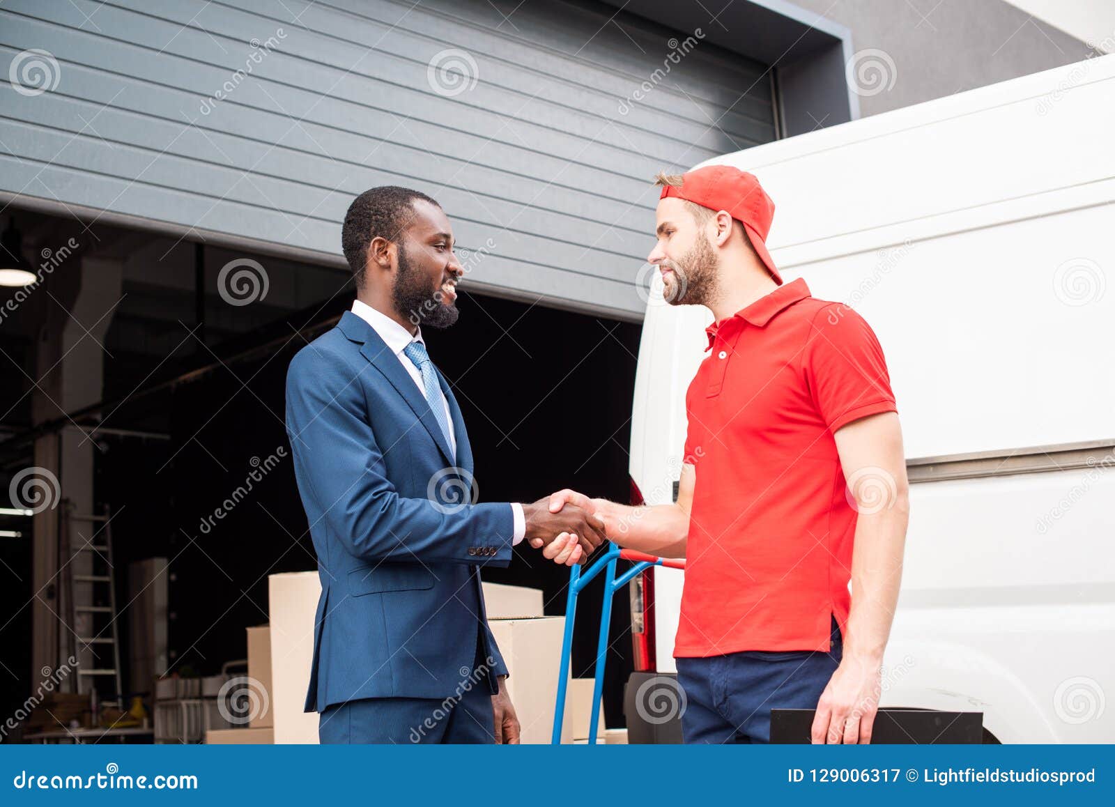 Side View of Multicultural Client and Delivery Man Stock Image - Image ...