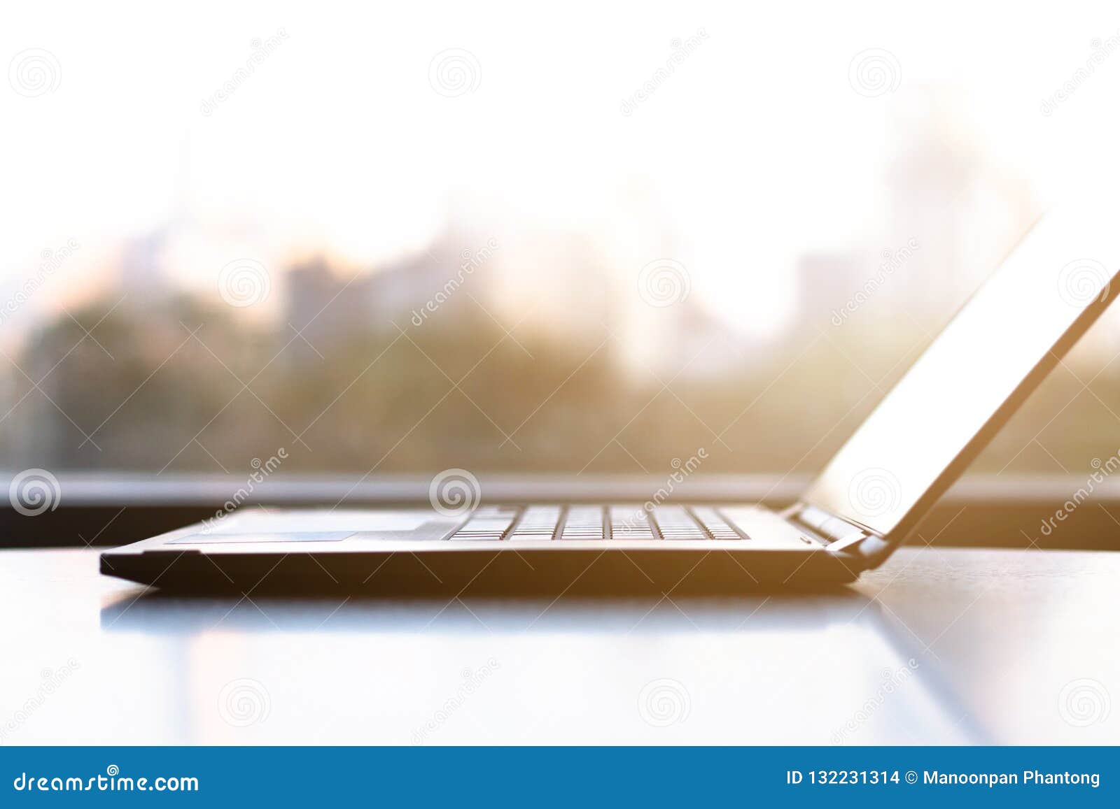 Side View of Office Laptop Computer on Desk Table Stock Photo - Image ...