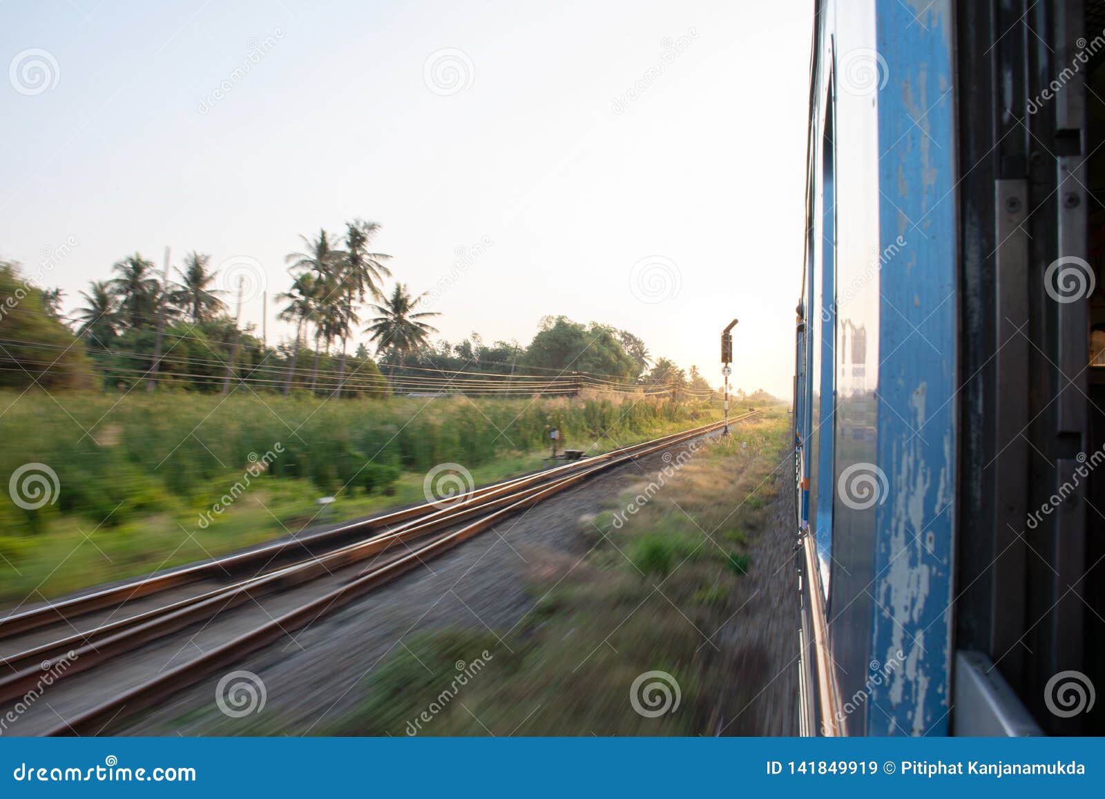 Side View of Old Passenger Train Moving through Natural Landscape Stock ...