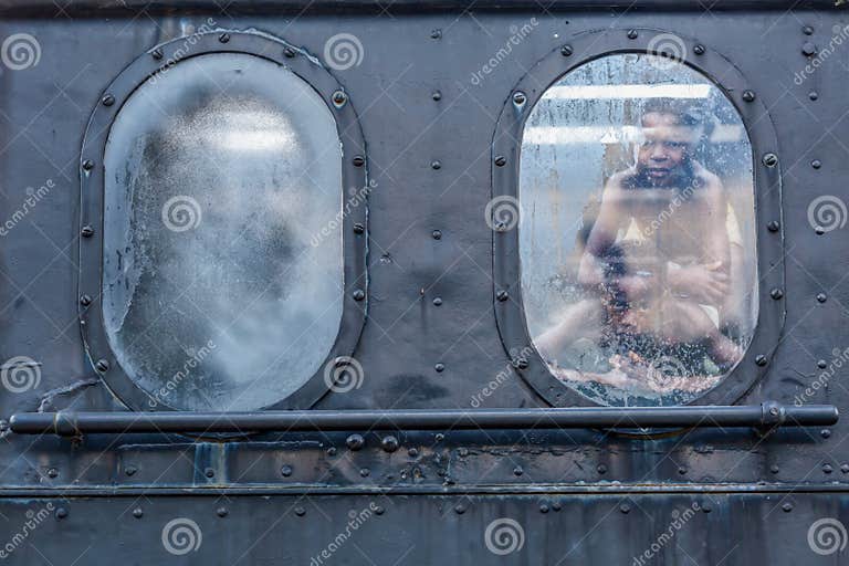 Side View of Old Train Cabin Window with Reflection of Two Children ...