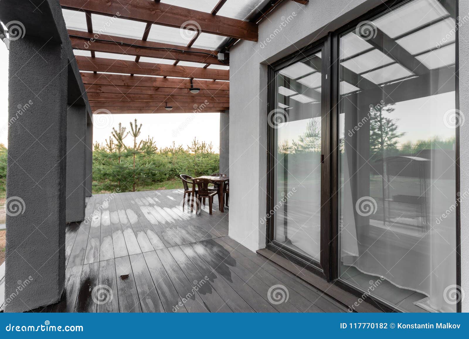 Side View of an Open Veranda in Front of a Modern Forest Cottage. Pine ...