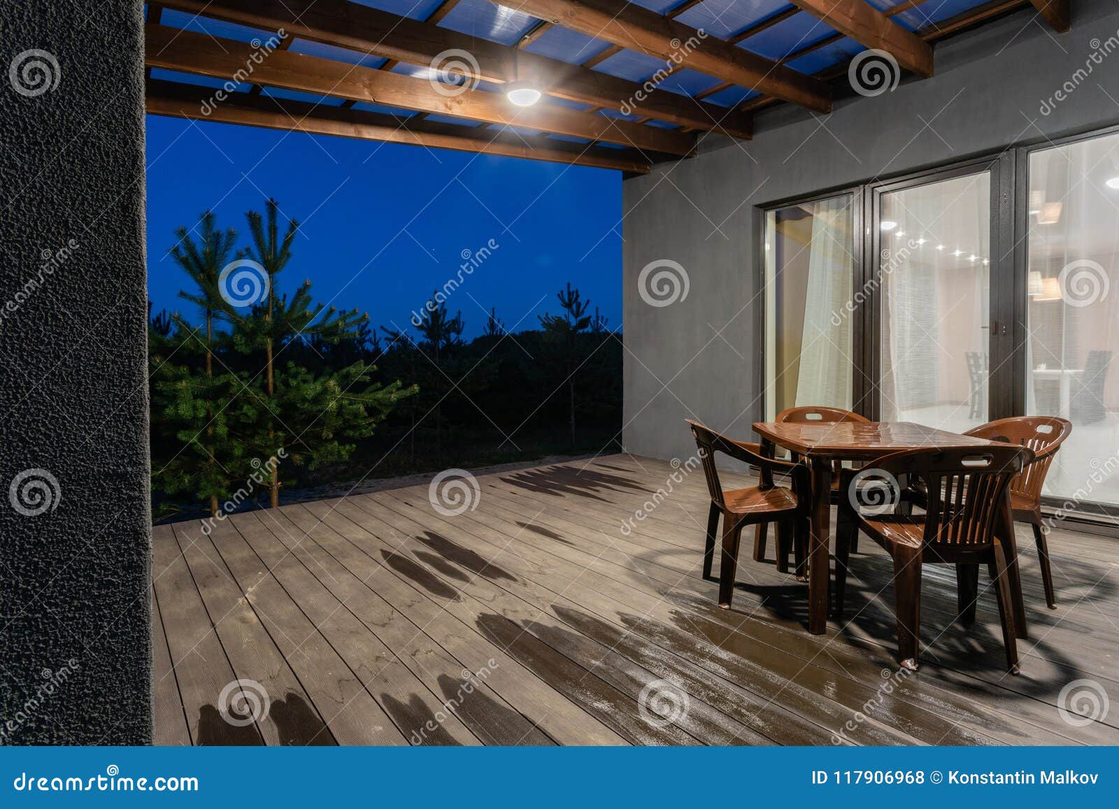 Side View of an Open Veranda in Front of a Modern Forest Cottage. Pine ...
