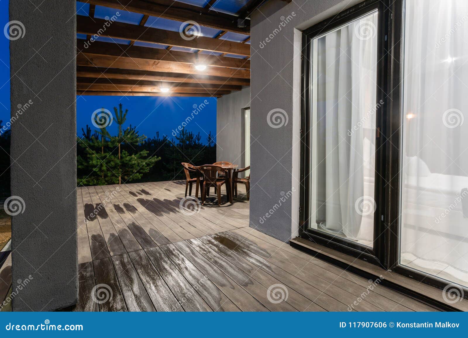 Side View of an Open Veranda in Front of a Modern Forest Cottage. Pine ...