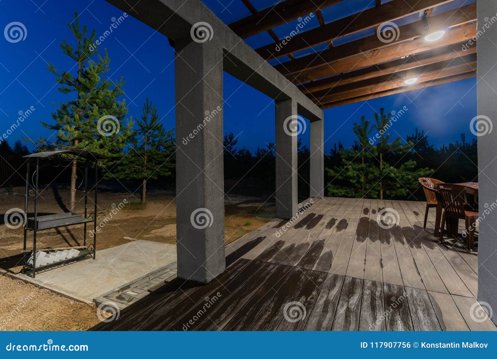 Side View of an Open Veranda in Front of a Modern Forest Cottage. Pine ...
