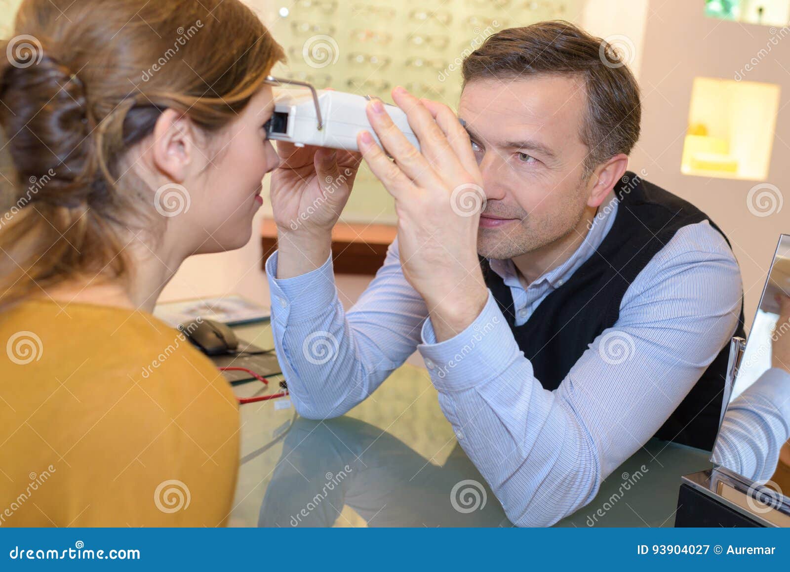 Side View Optician Doing Sight Testing for Client Stock Image - Image ...