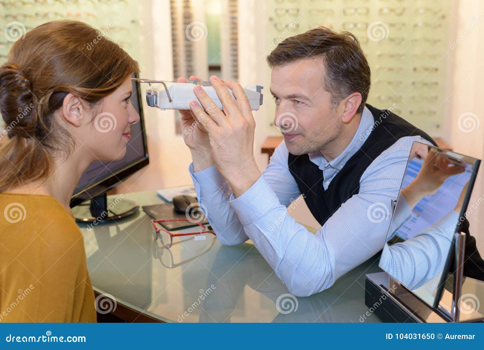Side View Optician Doing Sight Testing for Client Stock Photo - Image ...