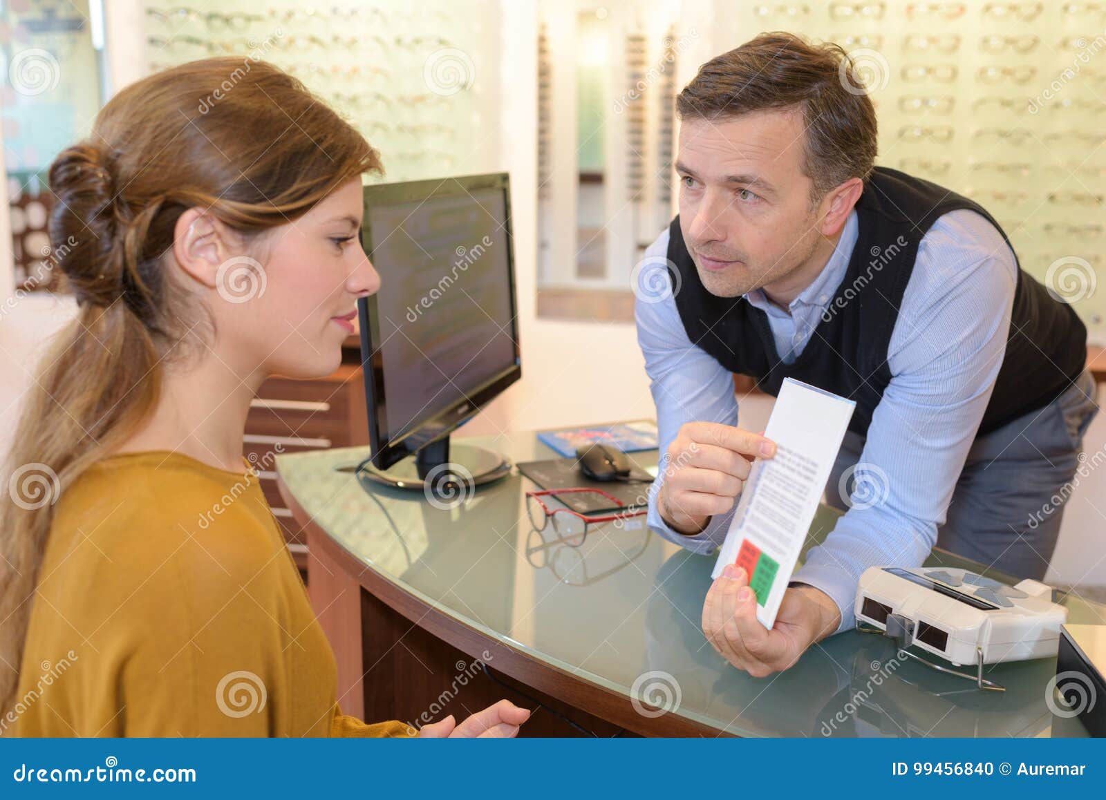 Side View Optician Doing Sight Testing for Client Stock Photo - Image ...