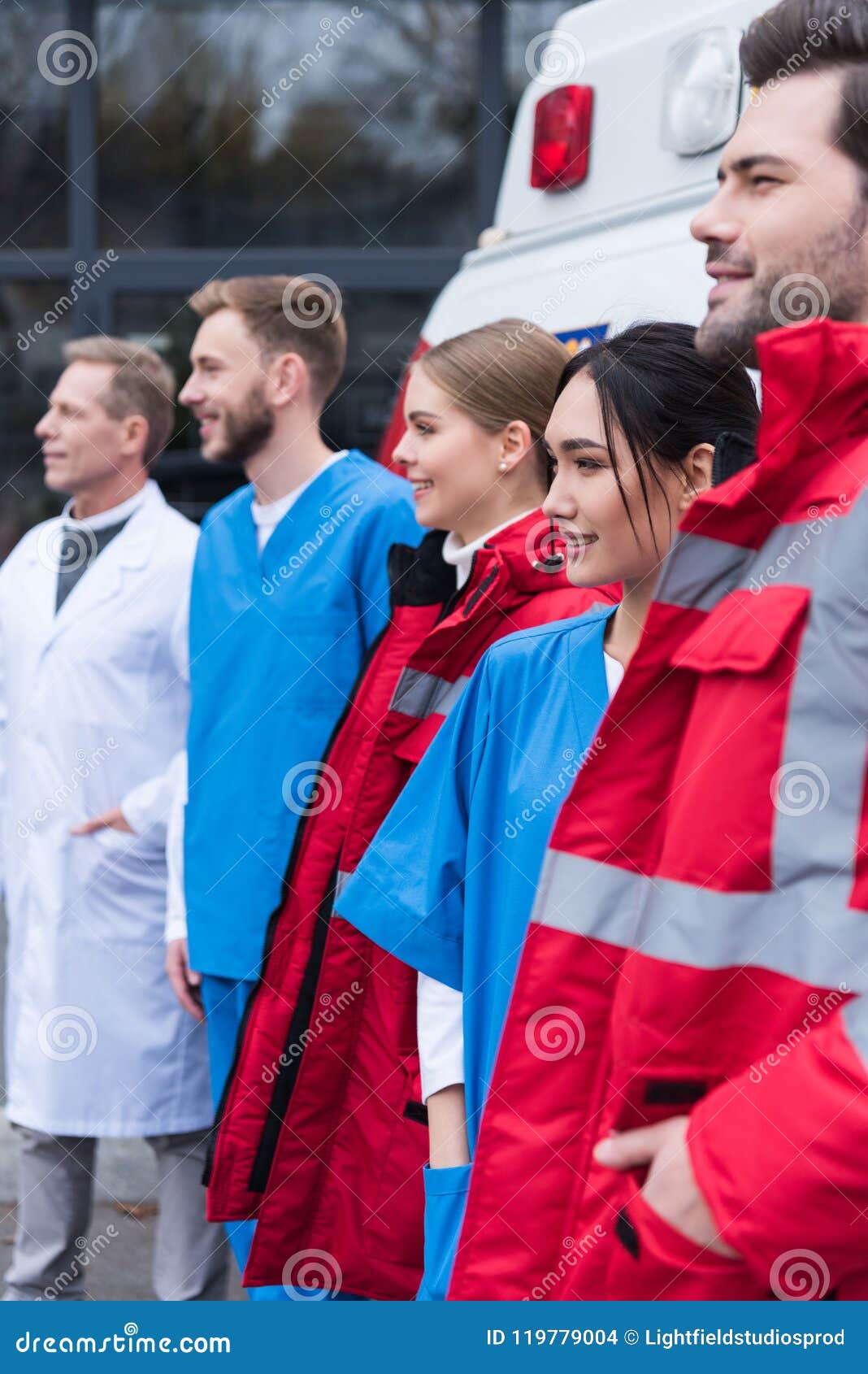 Side View of Paramedics Working Team Standing in Front Stock Photo ...