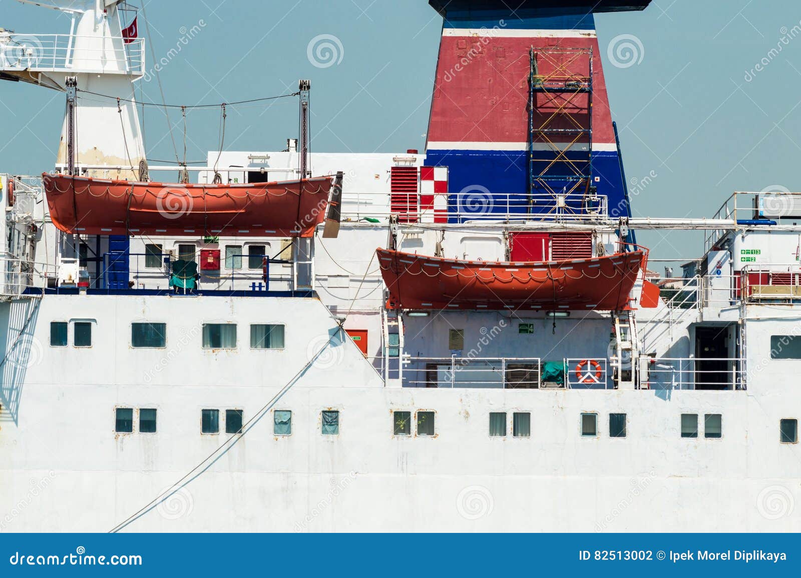 Side View of a Passenger Ship and Orange Lifeboats Stock Photo - Image ...