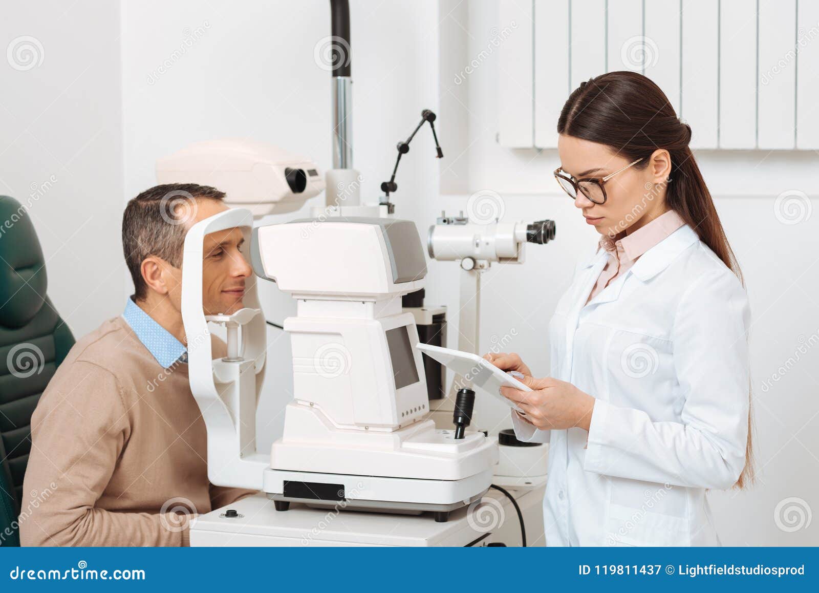 Side View of Patient Getting Eye Examination in Slit Lamp Stock Image ...