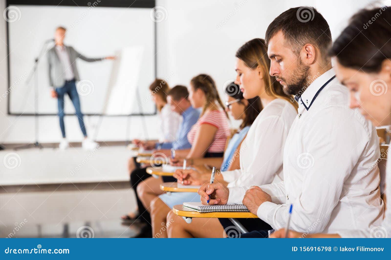 Side View of People Listening Lecturer Stock Photo - Image of indoors ...