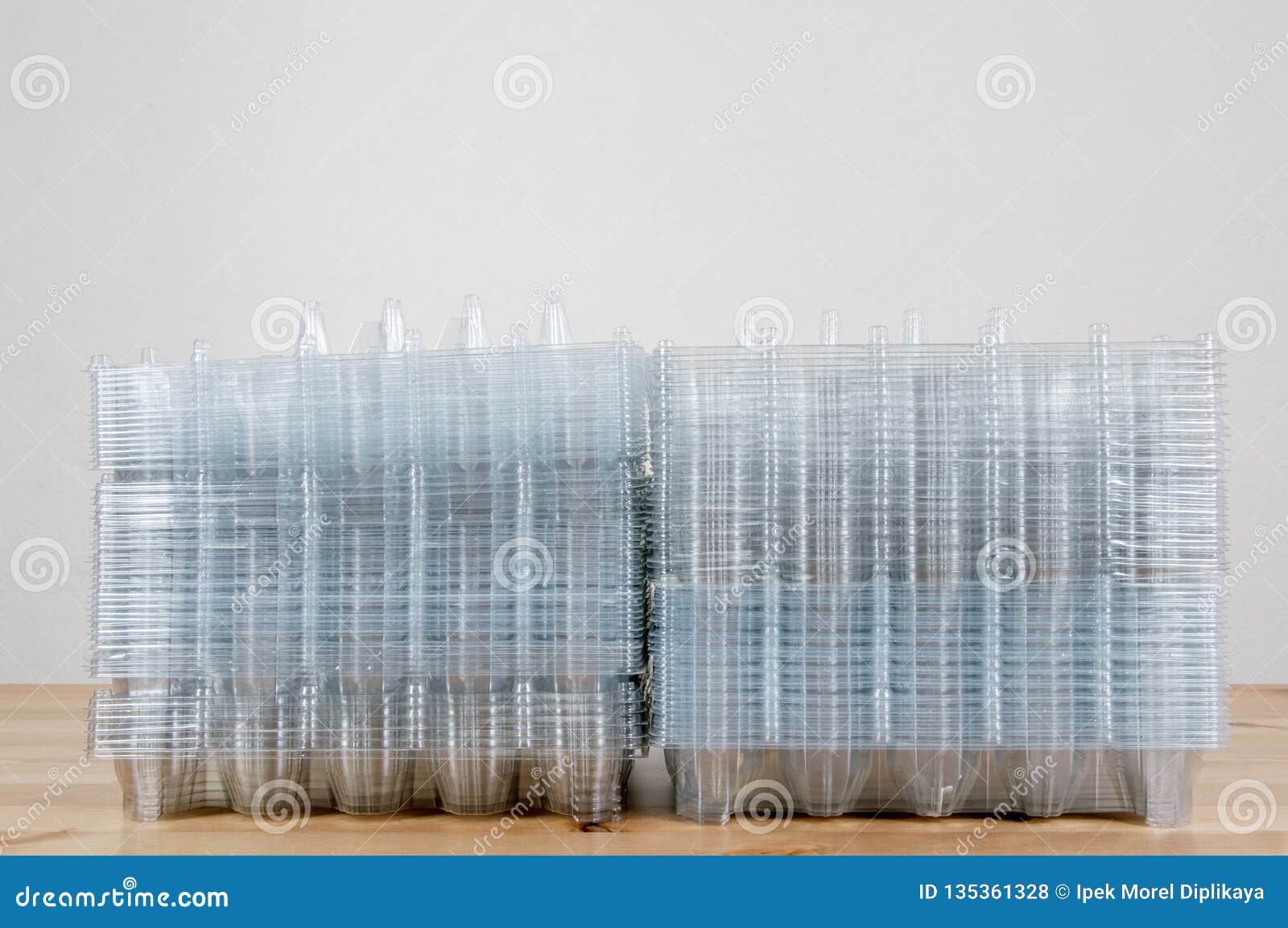 Side View of a Pile of Empty Plastic Egg Boxes on a Table Stock Photo ...