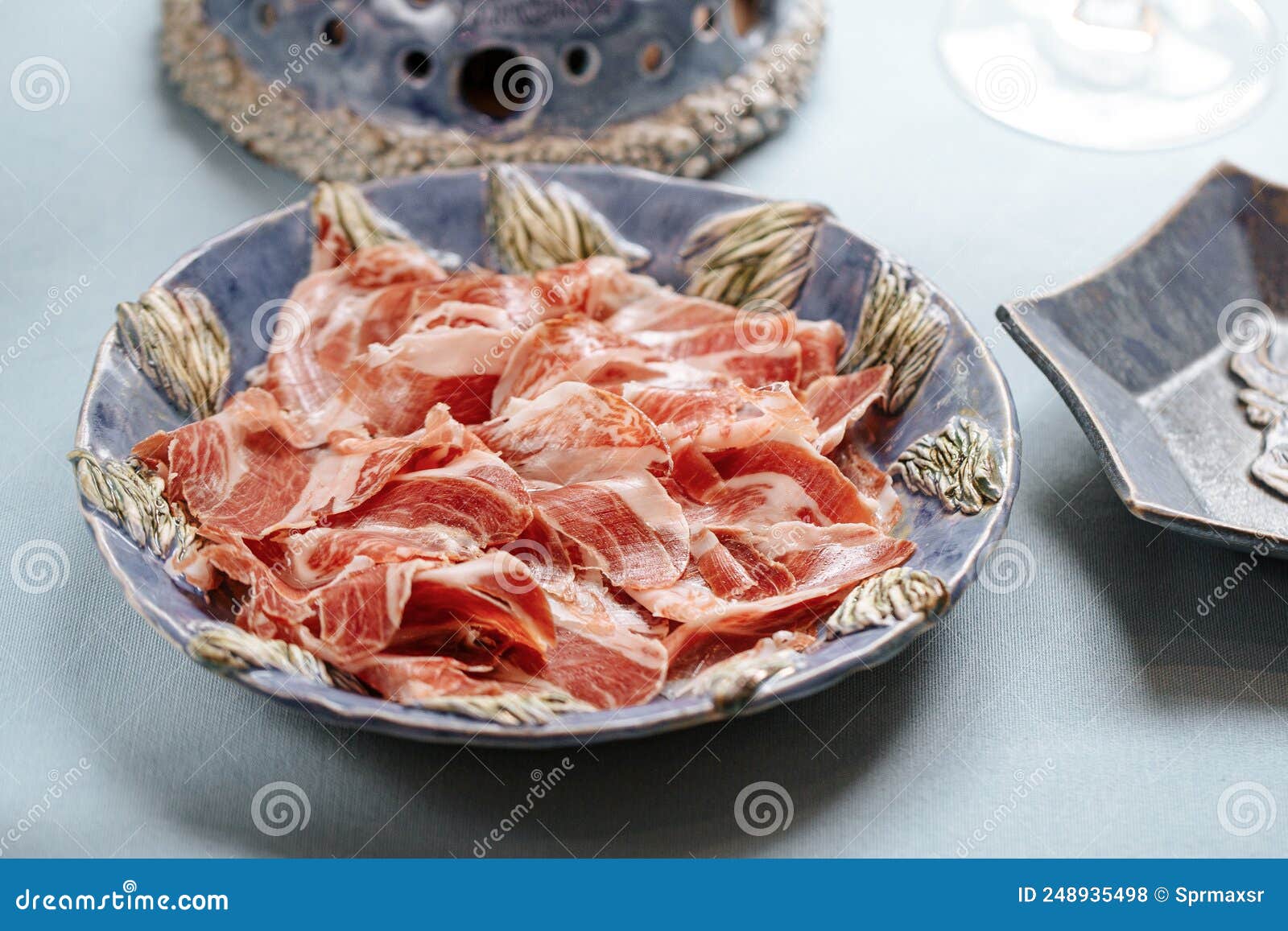 Side View on Plate of Spanish Jamon Appetizer Stock Photo - Image of ...
