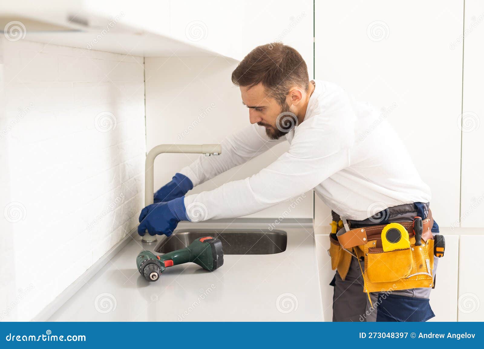 Side View of a Plumber Fixing Water Tap in Kitchen Stock Image - Image ...