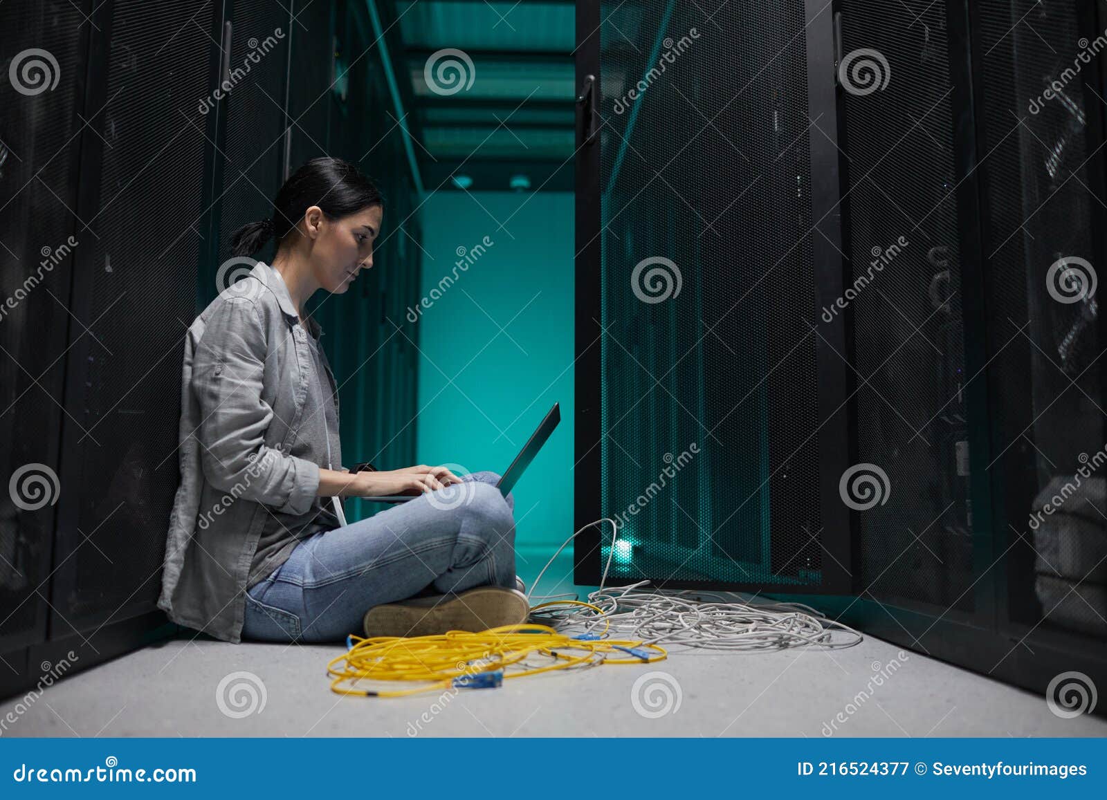 Woman Sitting on Floor in Server Room Stock Image - Image of cable ...