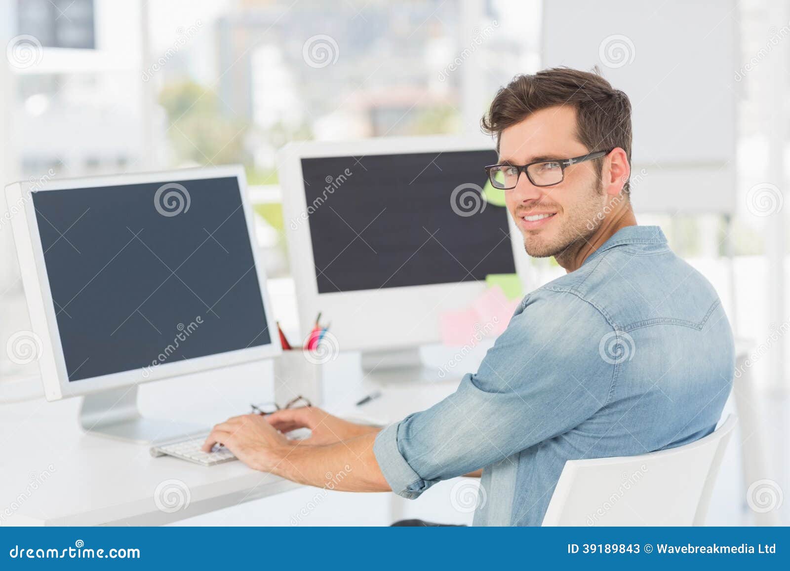 Side View Portrait of a Male Artist Using Computer Stock Image - Image ...