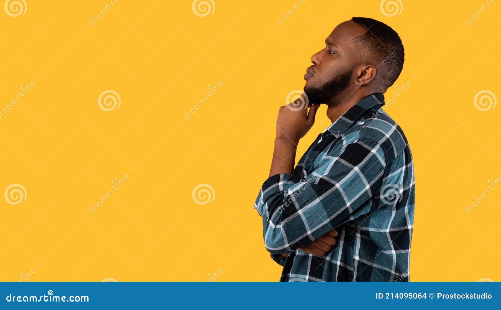 Side-View Portrait of Thoughtful Black Man Looking Aside, Yellow ...