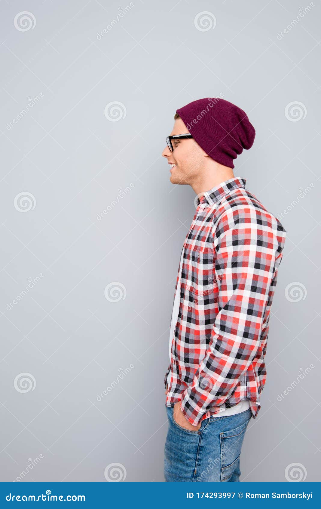 Side View Portrait of Young Hipster Guy in Glasses and Violet Cap Stock ...