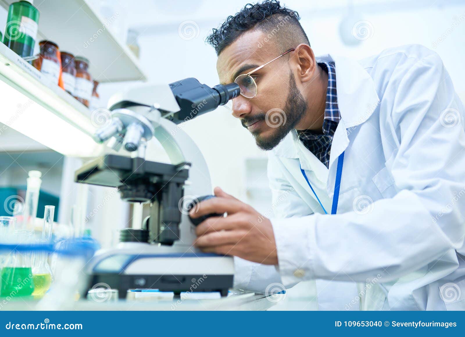 Scientist Using Microscope in Laboratory Stock Photo - Image of ...