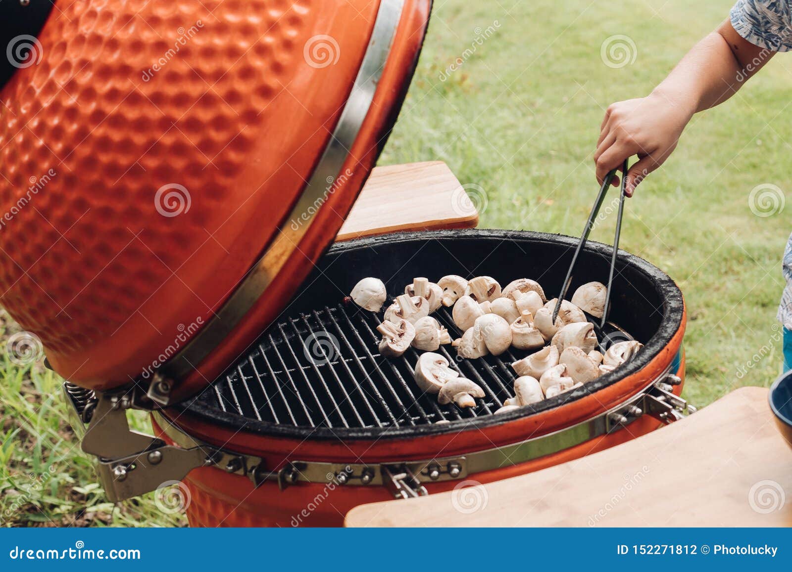 Side View of Process of Roasting Champignons on Grill Stock Photo ...