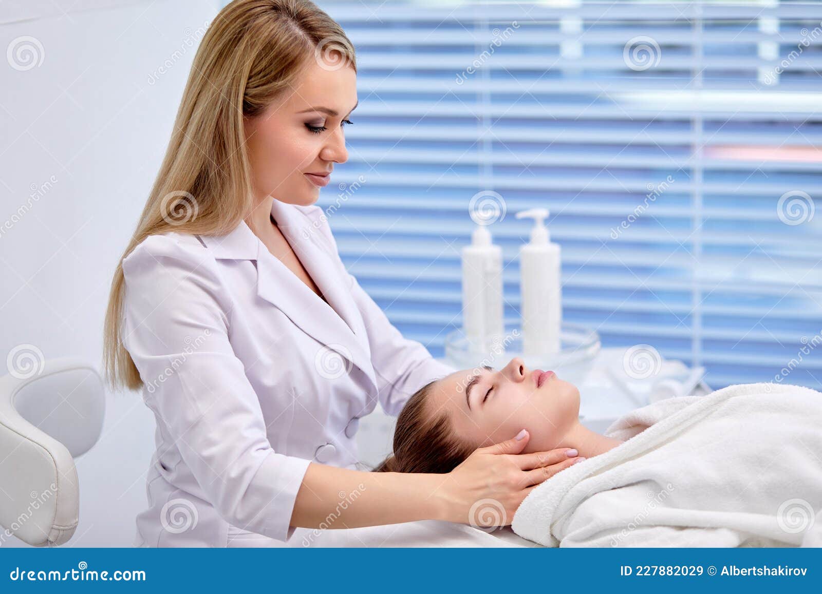 Side View On Professional Confident Cosmetologist Massaging Womanand X27