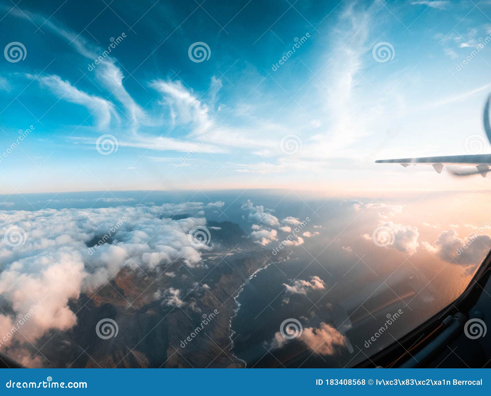 Side View of a Propeller Plane in Flight at Sunset Stock Photo - Image ...