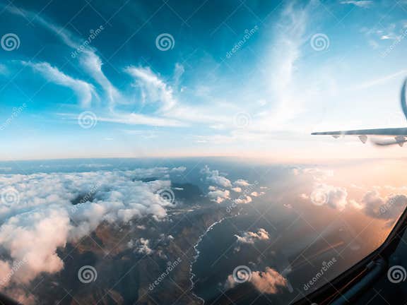 Side View of a Propeller Plane in Flight at Sunset Stock Photo - Image ...