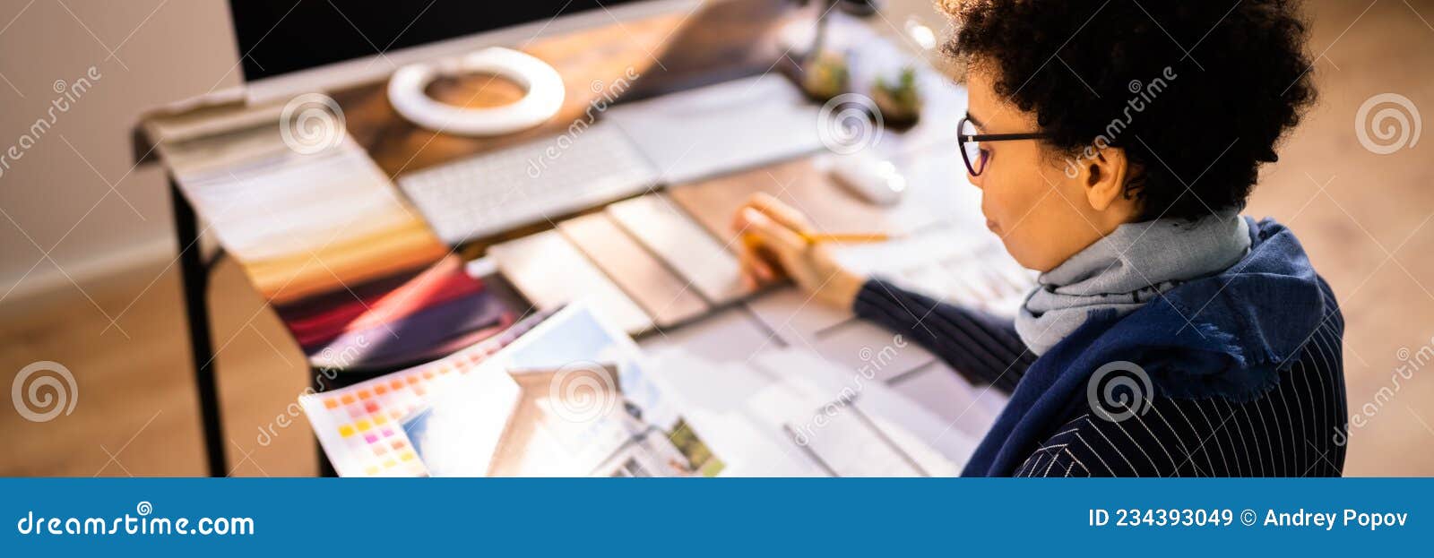 Side View of Real Estate Designer Working on Computer Stock Image ...