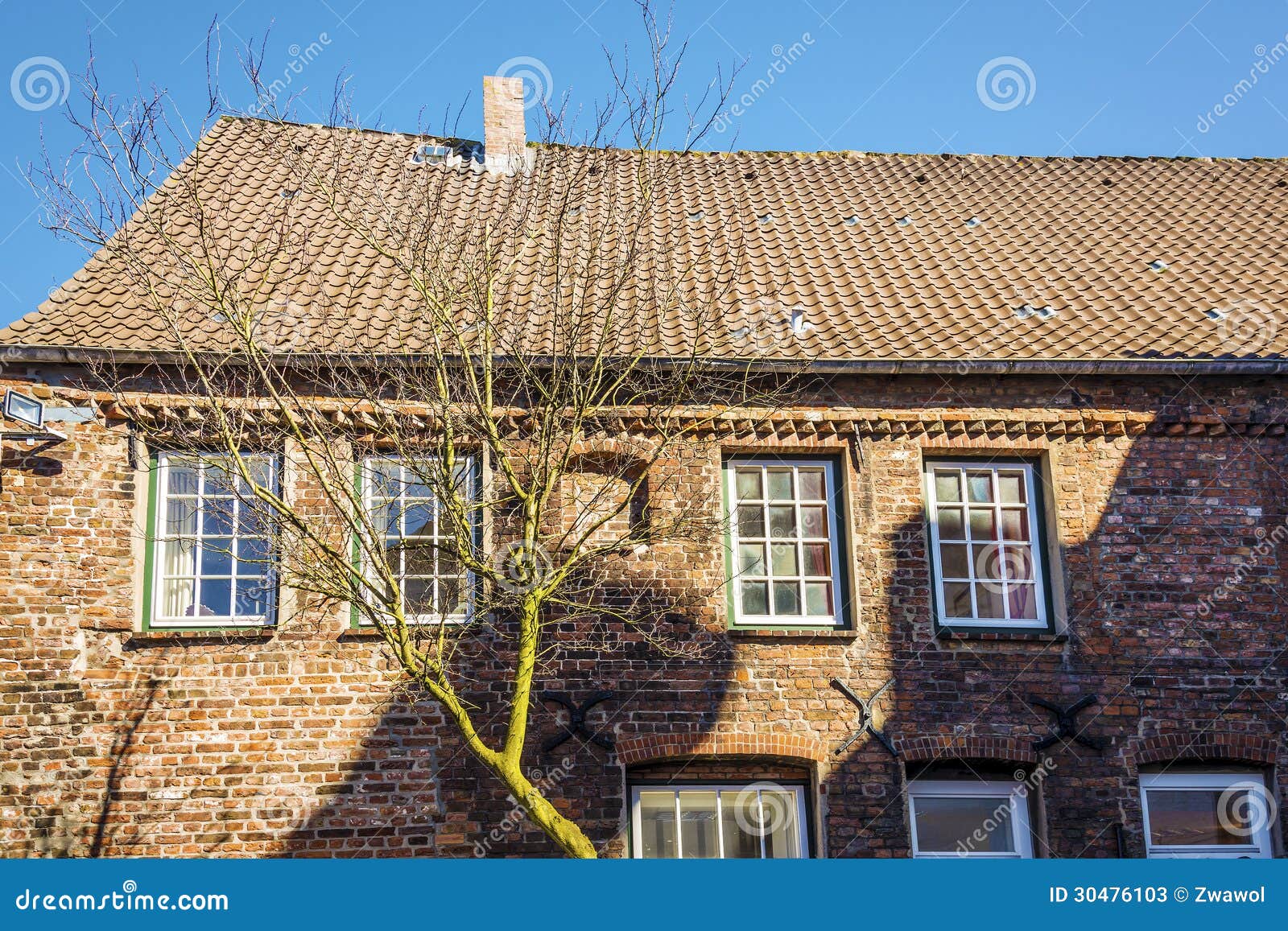 Side View red brick house stock image. Image of district - 30476103