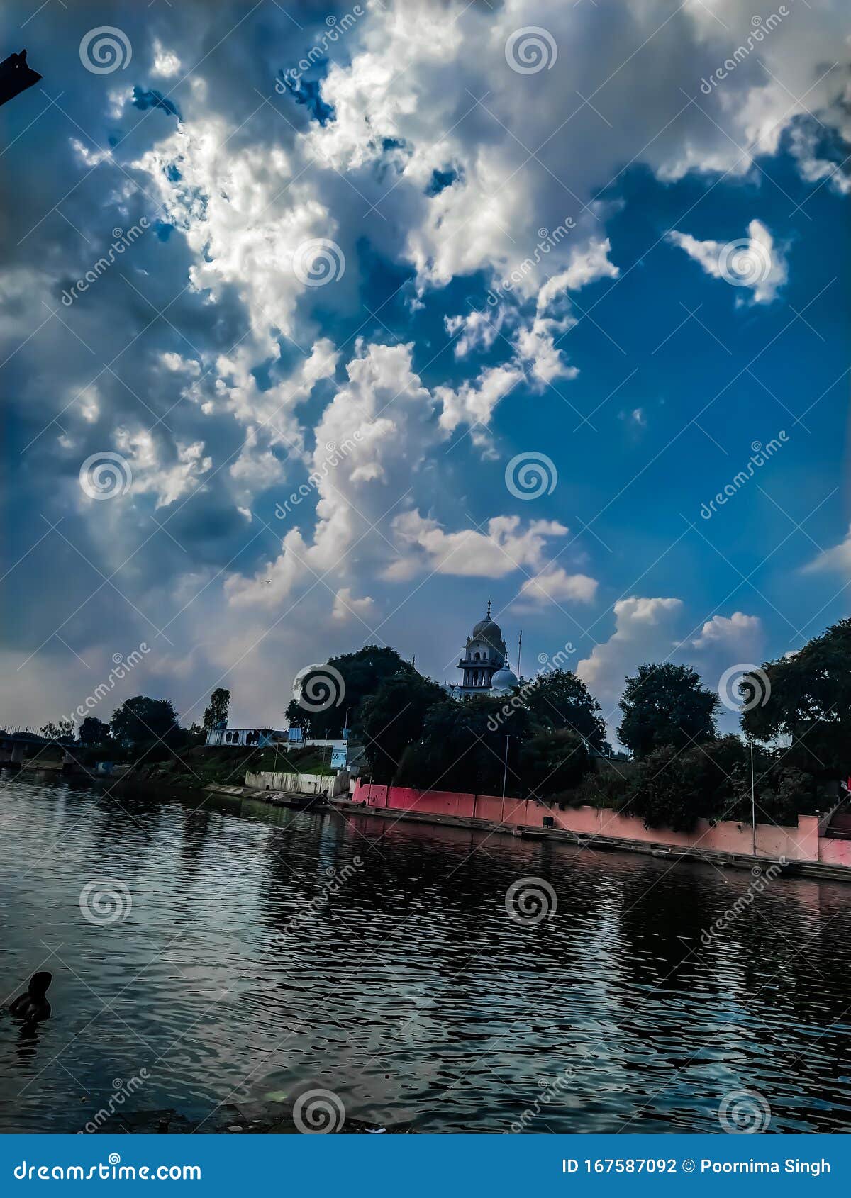 Side View of River with Huge White Clouds in the Sky in a Day Time ...