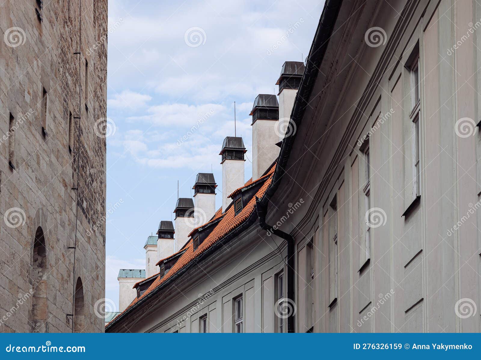 Side View of the Roof with Old Chimneys from the Wall of Building Stock ...