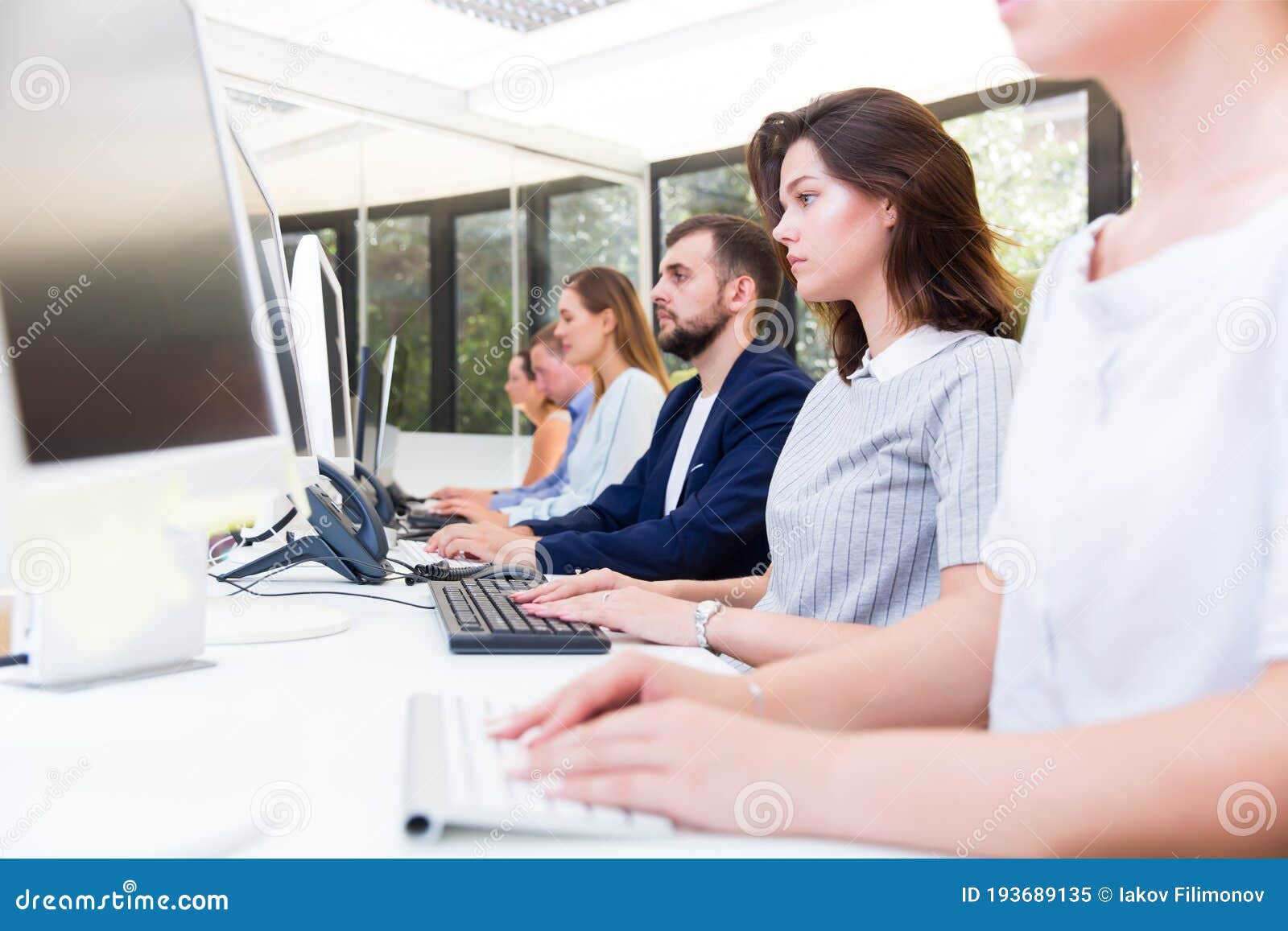 Side View of Row of Ordinary People Working Stock Image - Image of ...