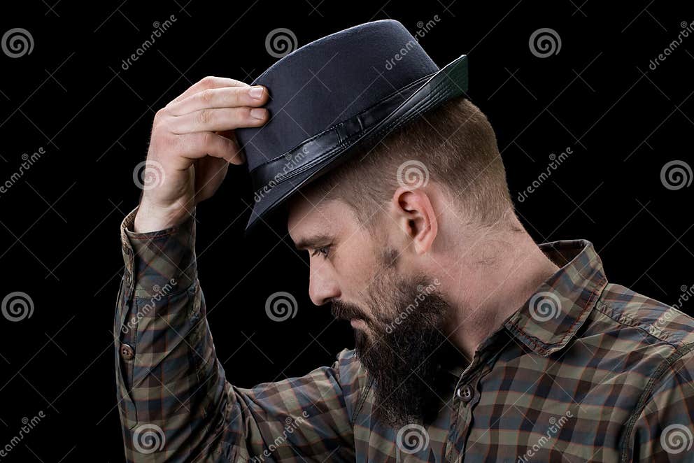 Side View of Sad Bearded Man with Hat Looking Down Stock Photo - Image ...