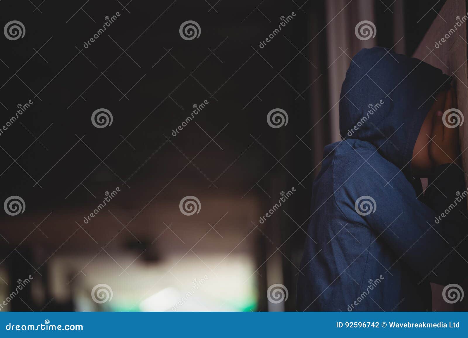 Side View of Sad Boy Covering His Face with Hands while Leaning on Wall ...