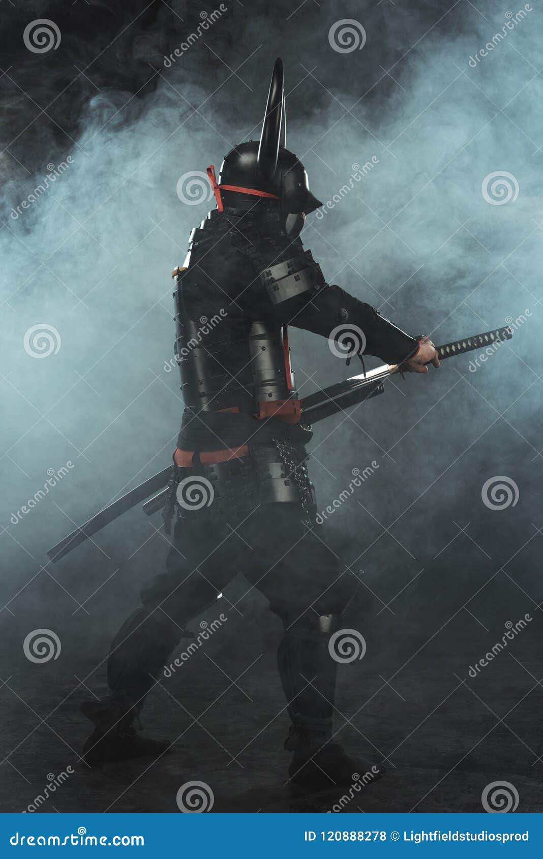 Side View of Samurai Taking Out His Katana on Dark Background Stock ...
