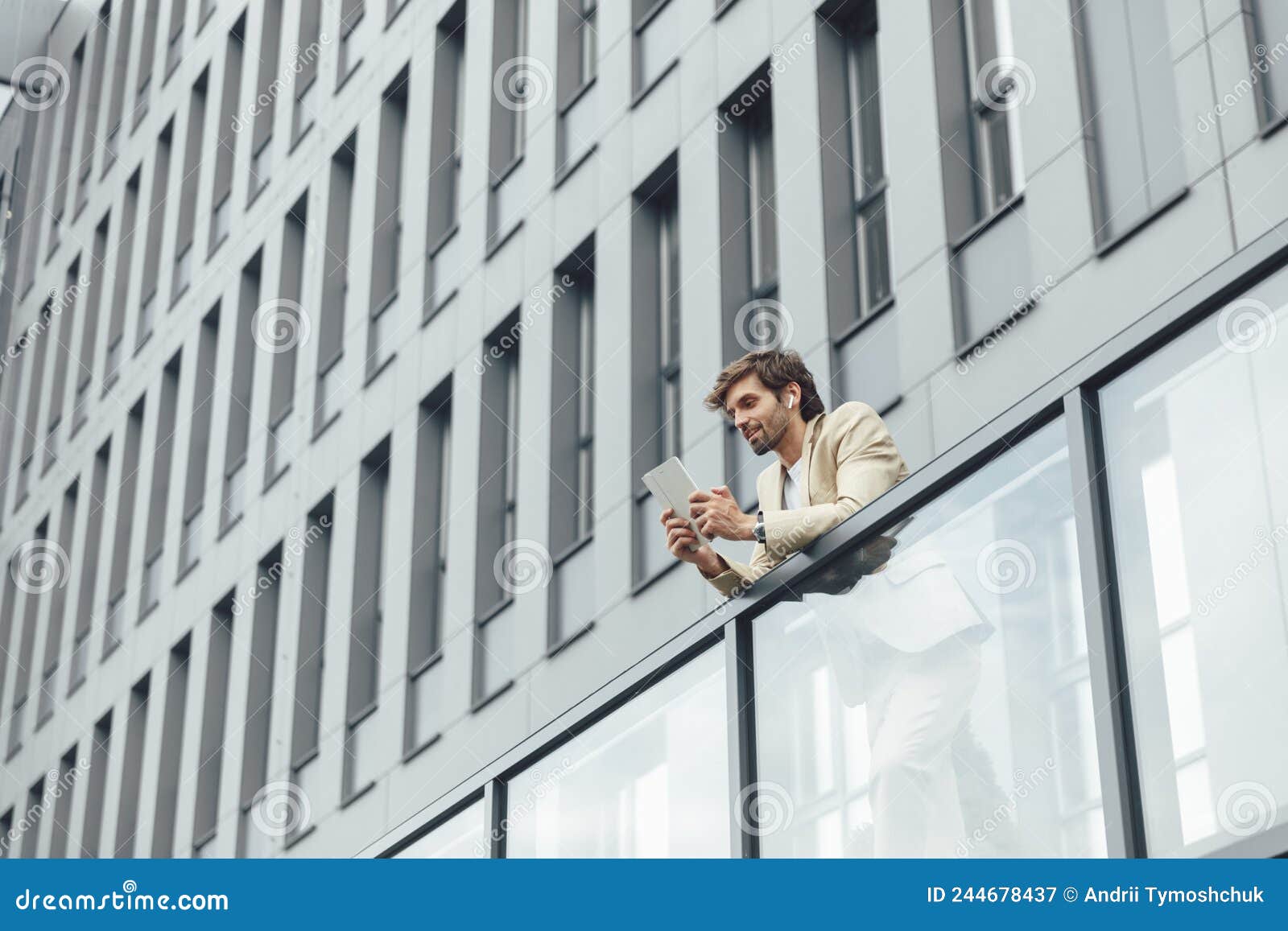 Side View of Self-sufficient Man Using Tablet Outside Stock Image ...