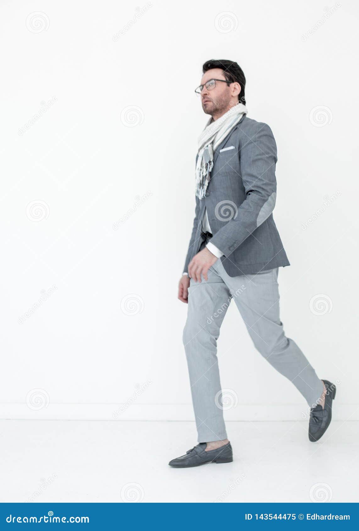 Side View .a Serious Man Confidently Striding Forward Stock Image ...