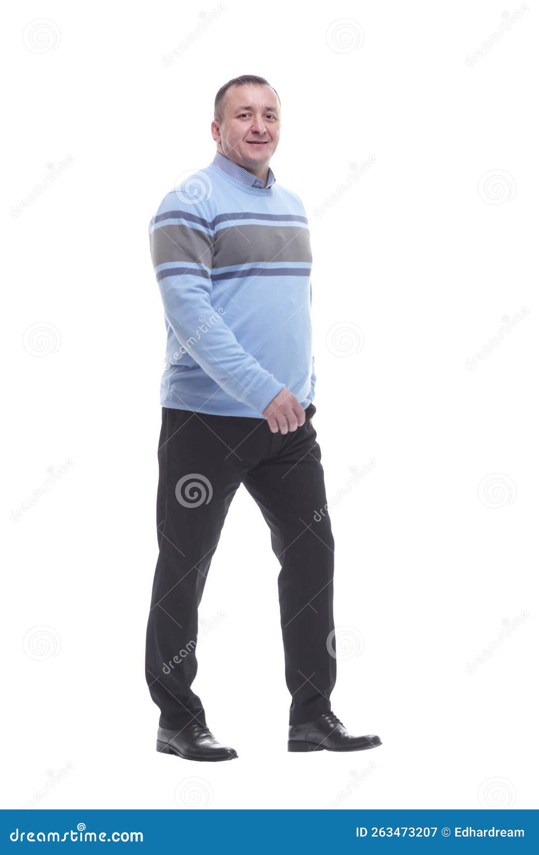 Side View. a Serious Man in a Sweater Walks Forward Stock Image - Image ...