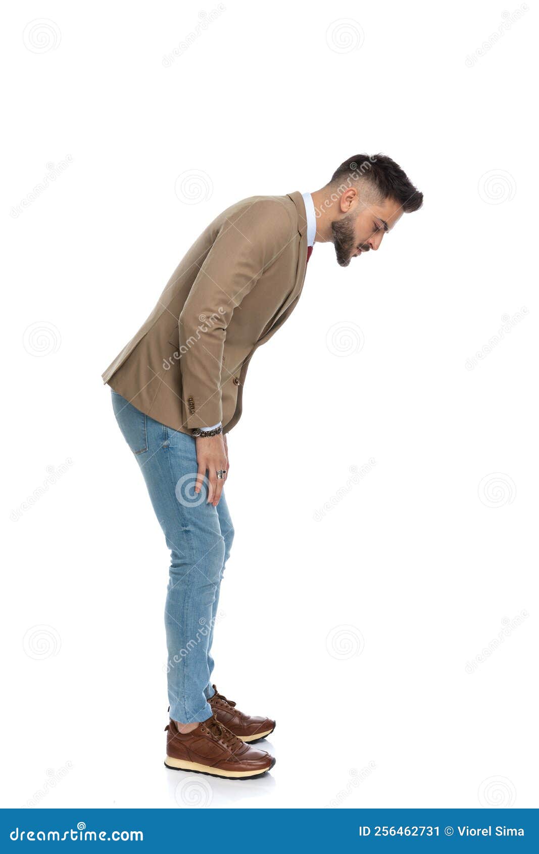 Side View of Man with Beard Looking Down To See Something Tiny Stock ...
