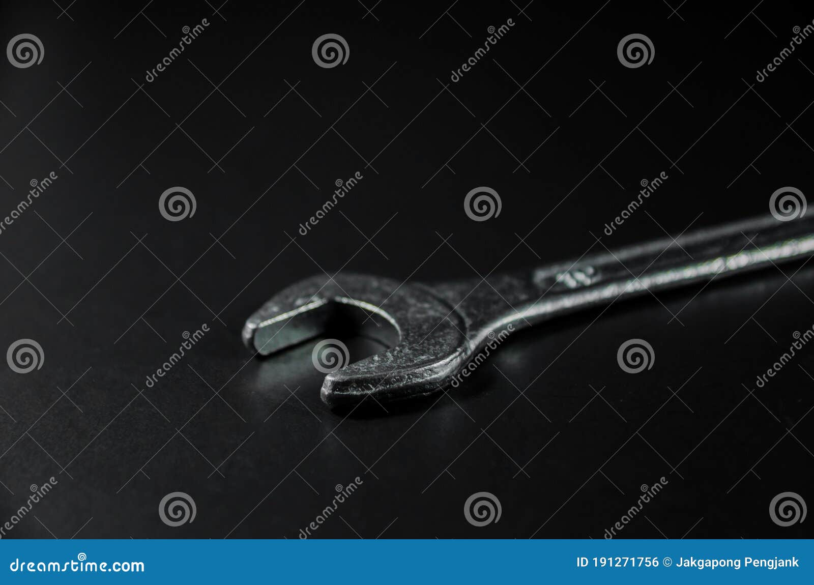 Side View of Silver Wrench on Dark Light Stock Photo - Image of ...