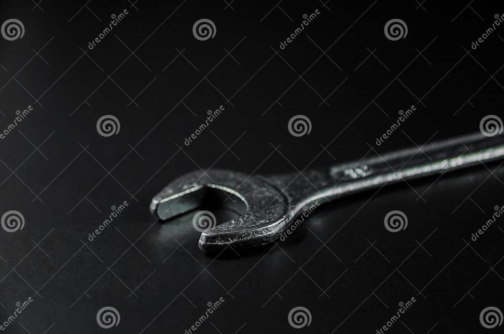 Side View of Silver Wrench on Dark Light Stock Photo - Image of ...