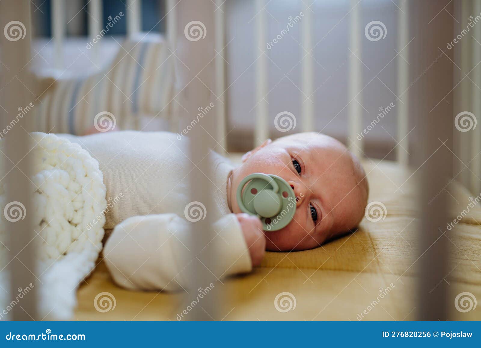 Side View of Sleeping Baby in Little Bed. Stock Photo - Image of ...