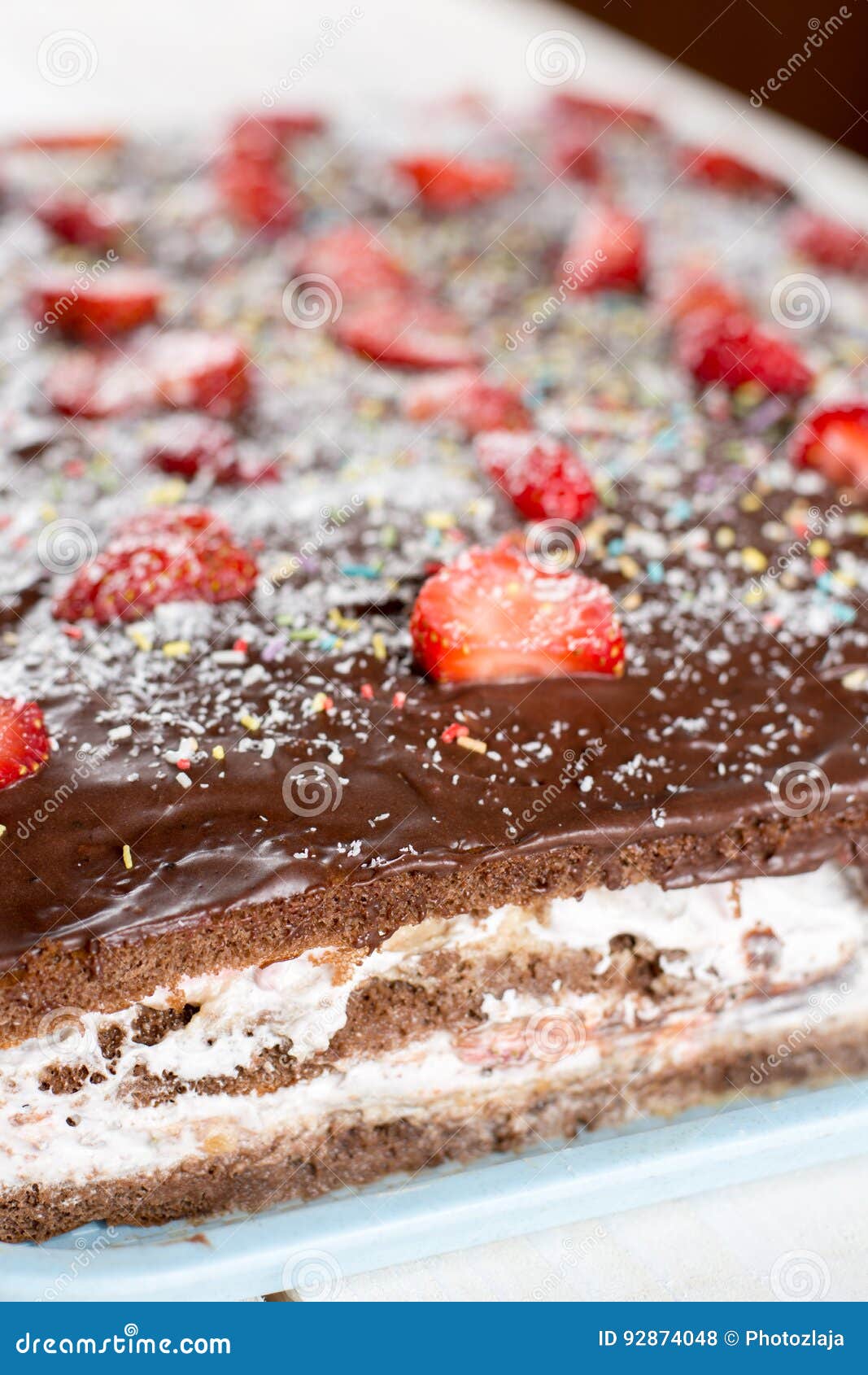 Side View of Sliced Chocolate Cake with Fresh Strawberries. Stock Photo ...