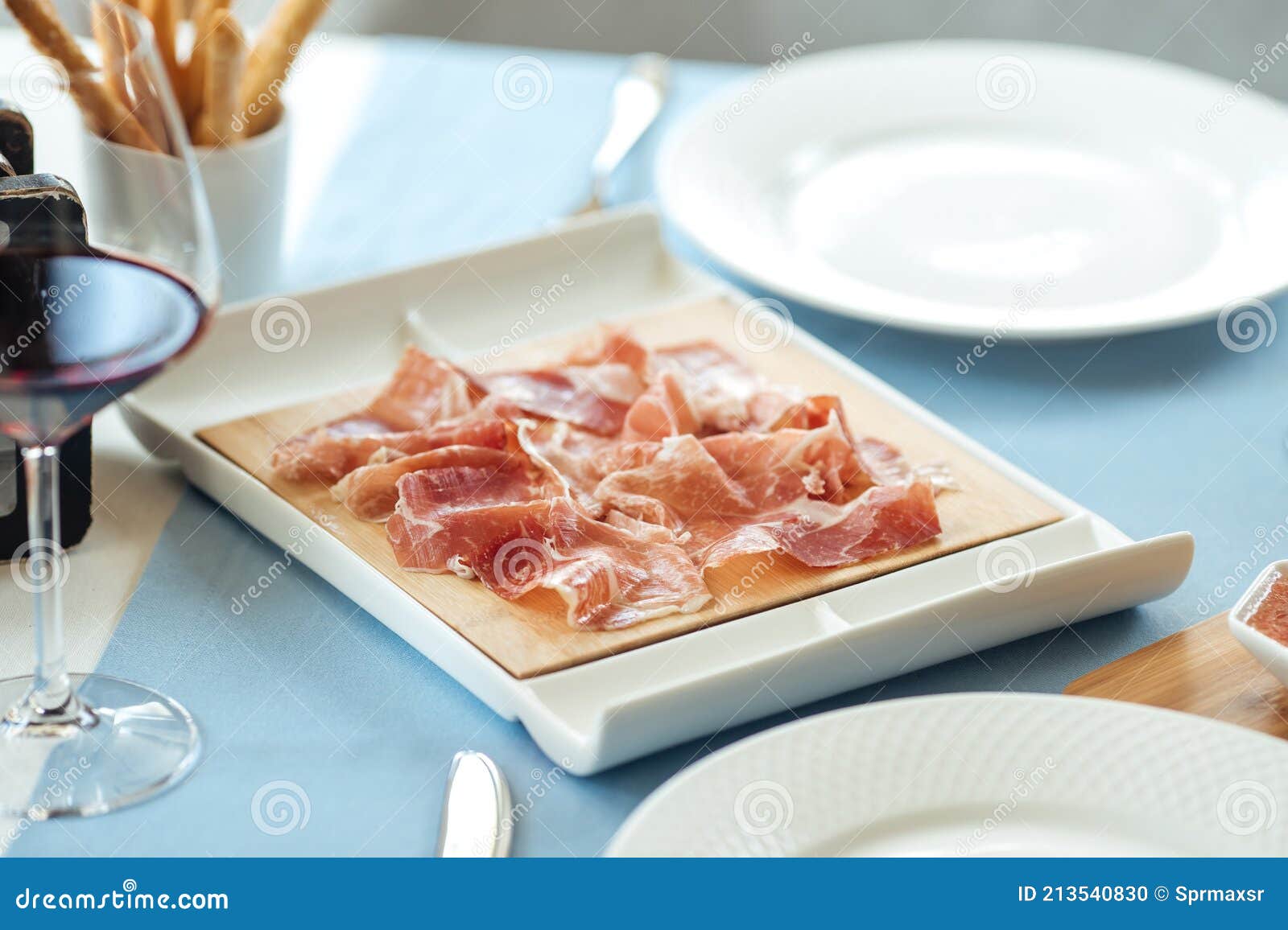 Sliced Jamon Meat on the Restaurant Table Stock Photo - Image of pork ...