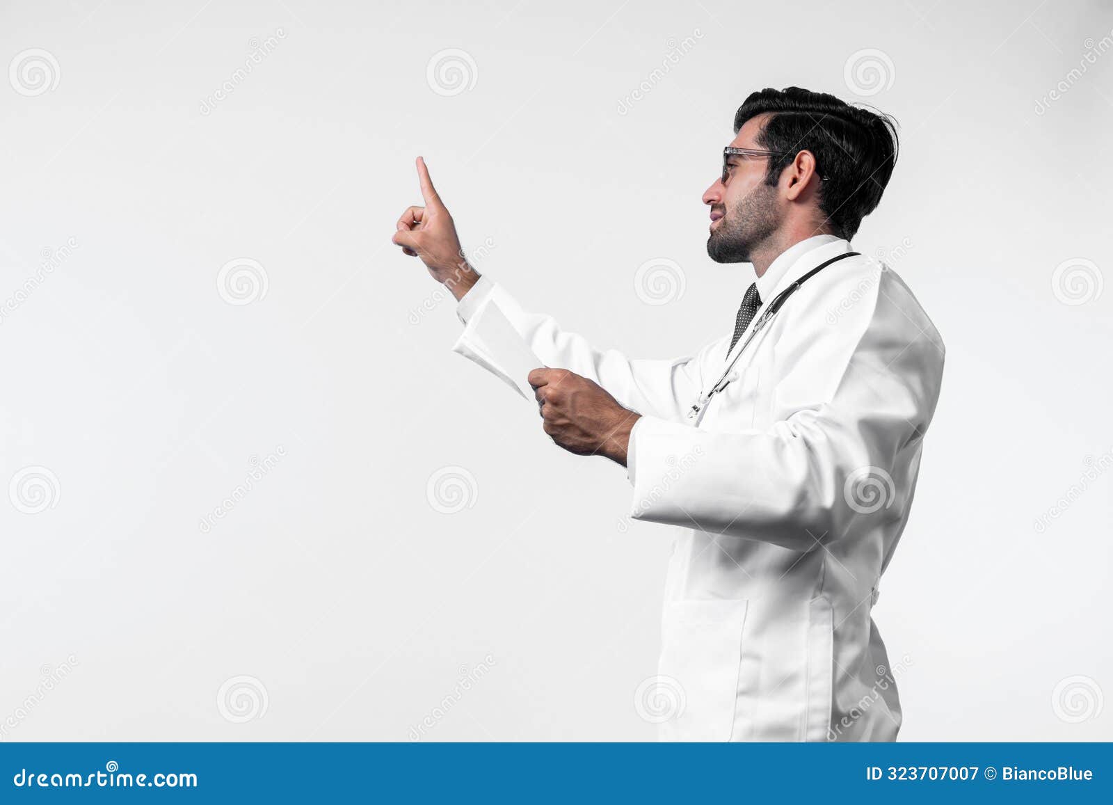 Side View of Smart Doctor Pointing and Checking and Looking at Chart ...