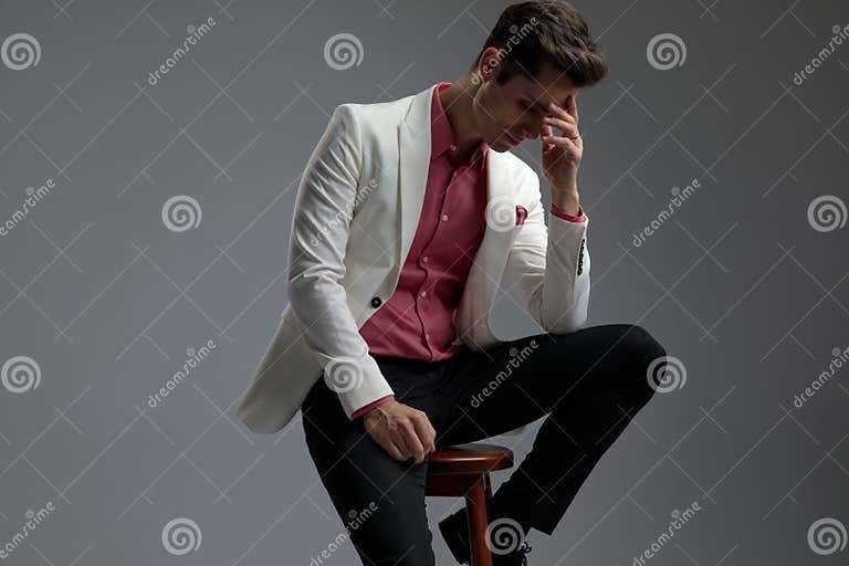 Side View of Smart Guy Having Headache while Looking Down Stock Photo ...
