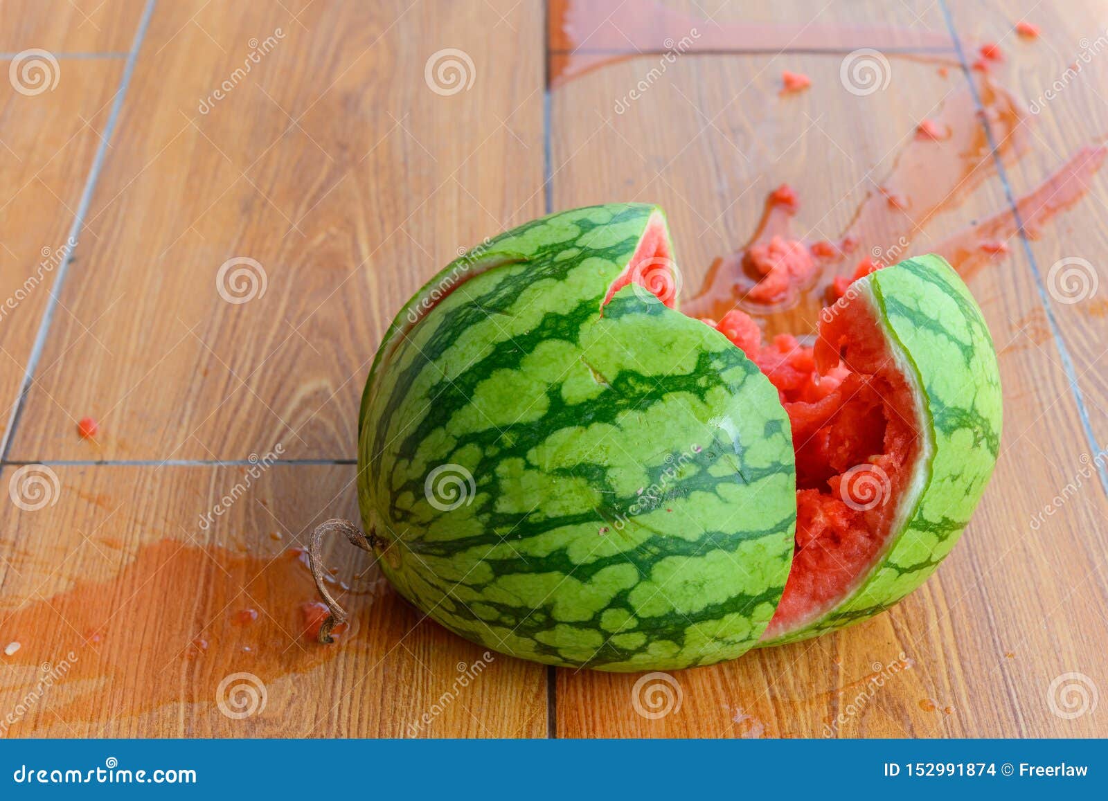 Smashed Watermelon on the Ground Stock Photo - Image of fallen, fruit ...